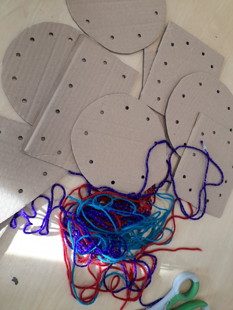 Sewing cardboard shapes | The Froebel Partnership